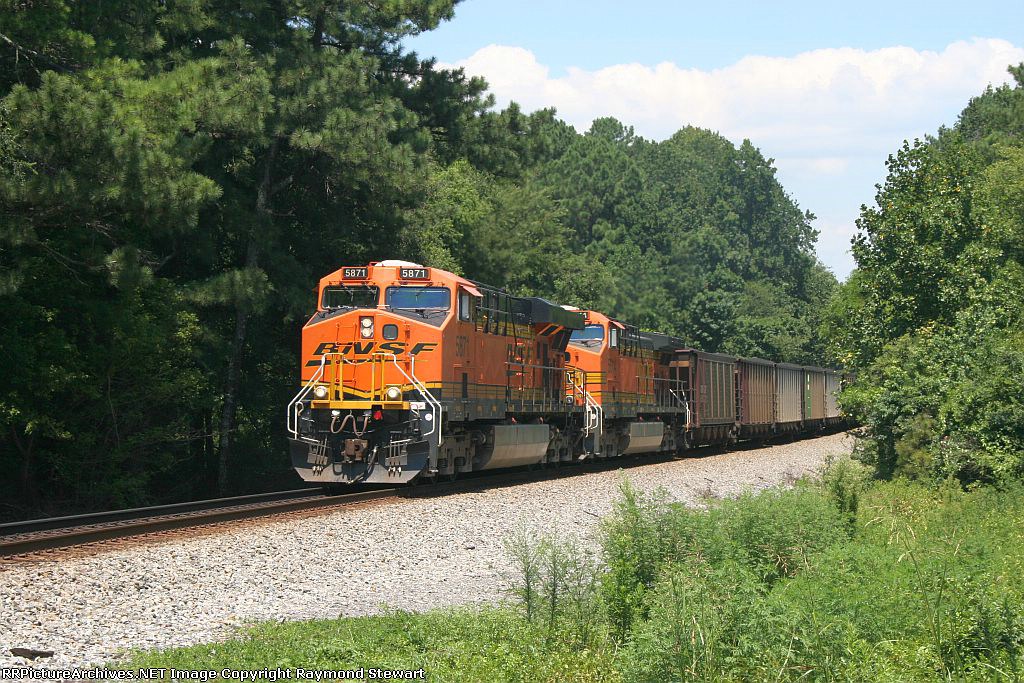 BNSF 5871 leads coal train NS 736 south